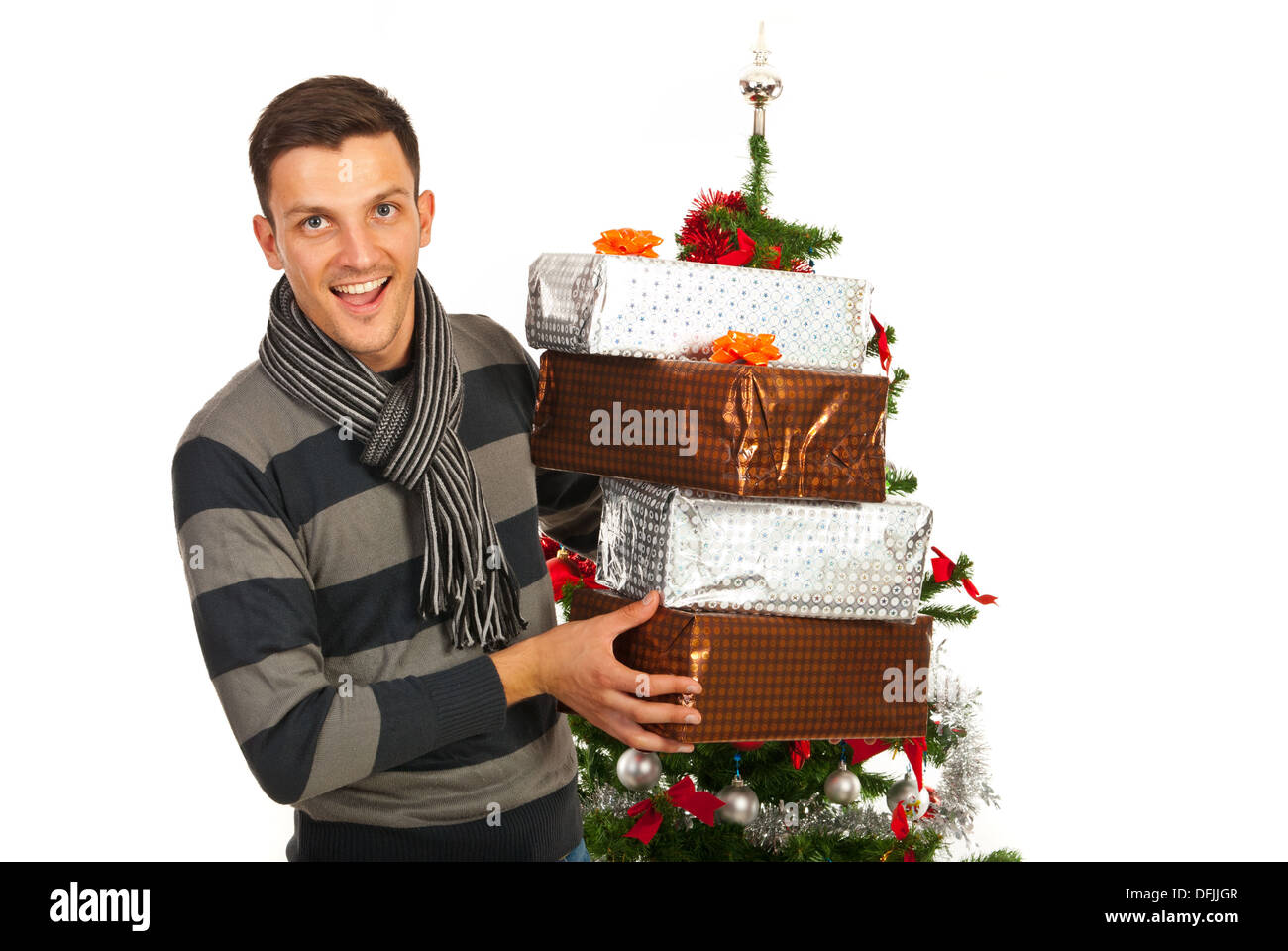 Young man stack of christmas presents hi-res stock photography and ...