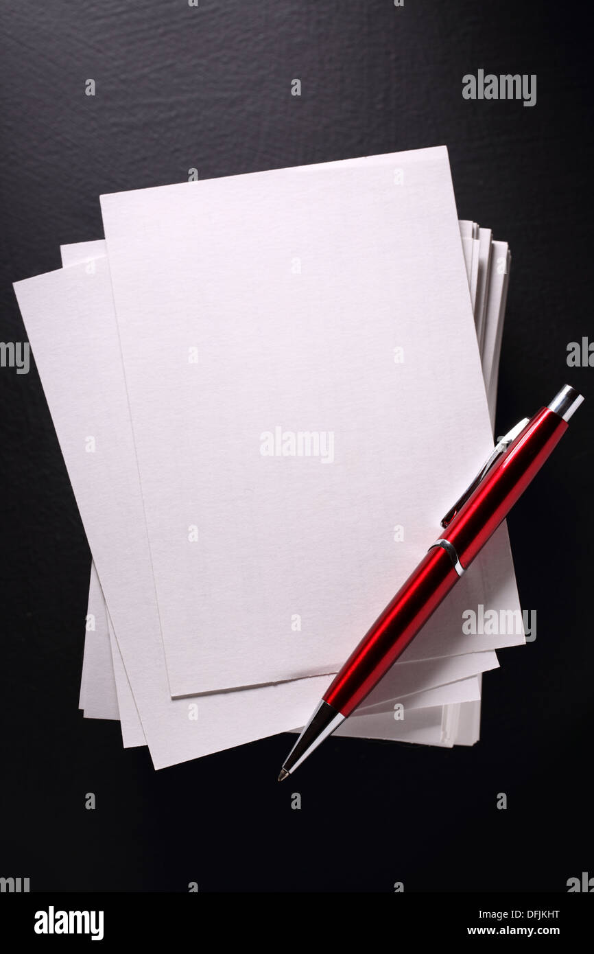 Stack of paper cards and pen Stock Photo - Alamy
