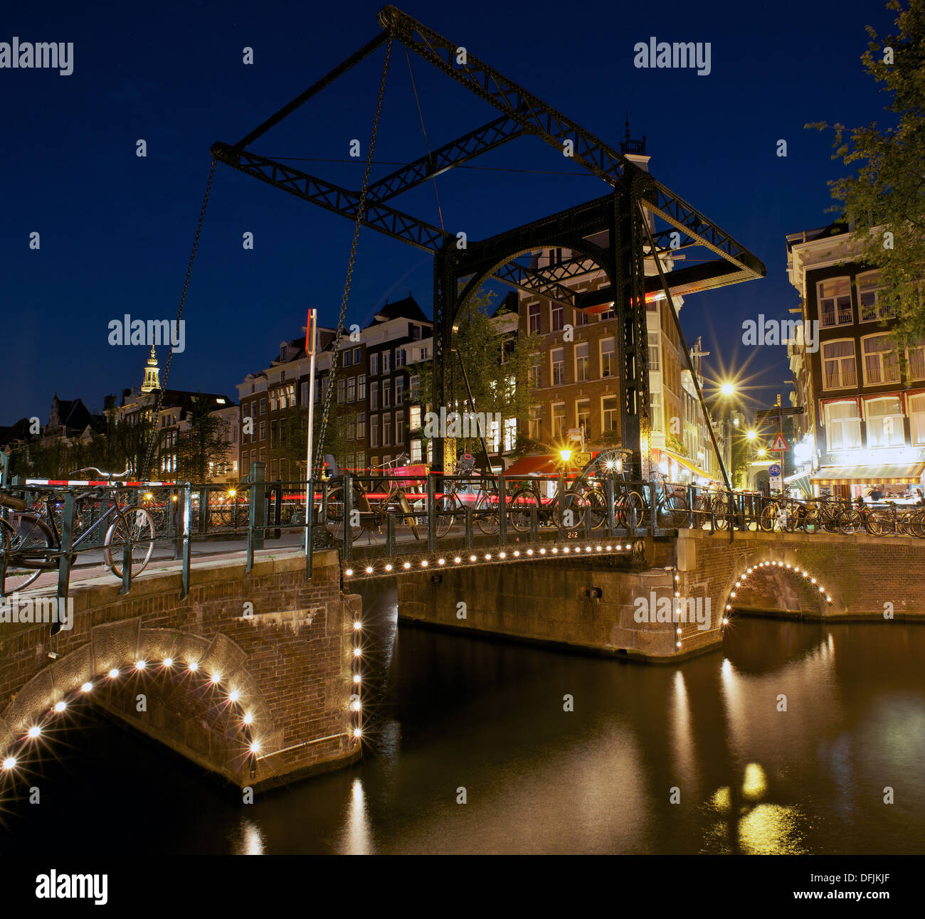 single swipe bridge illuminated on Kloveniers-burgwal Amsterdam ...