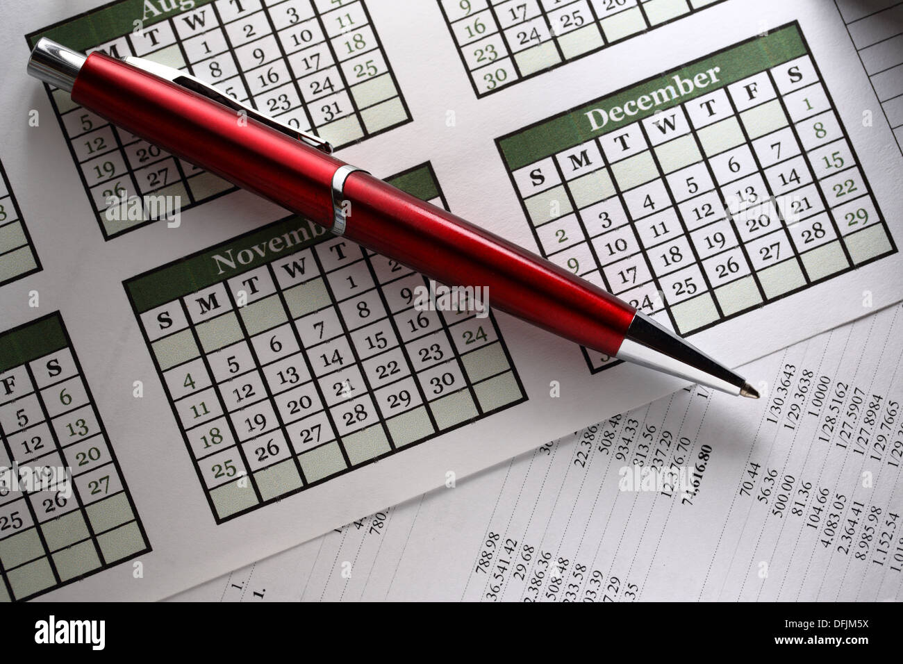 Operating budget, calendar and pen Stock Photo - Alamy