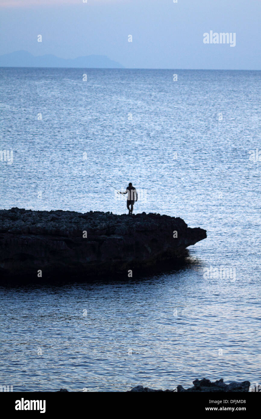 Rocky outcrop into sea hi-res stock photography and images - Alamy