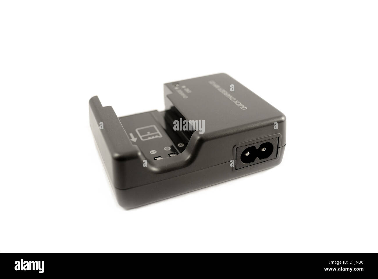 Battery charger with DSLR battery isolated on white Stock Photo - Alamy