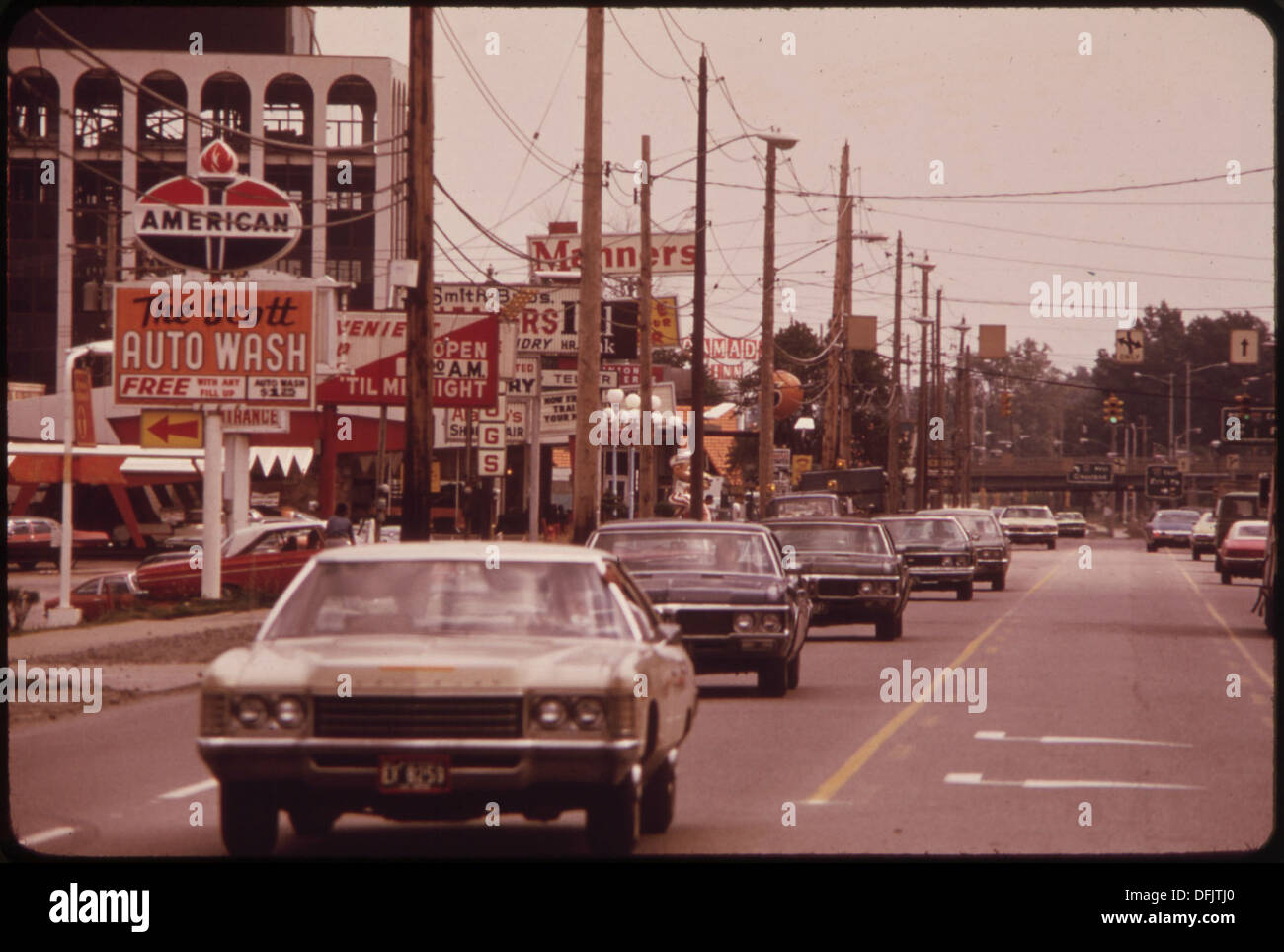 This photograph shows the rapid urban development along a freeway ...