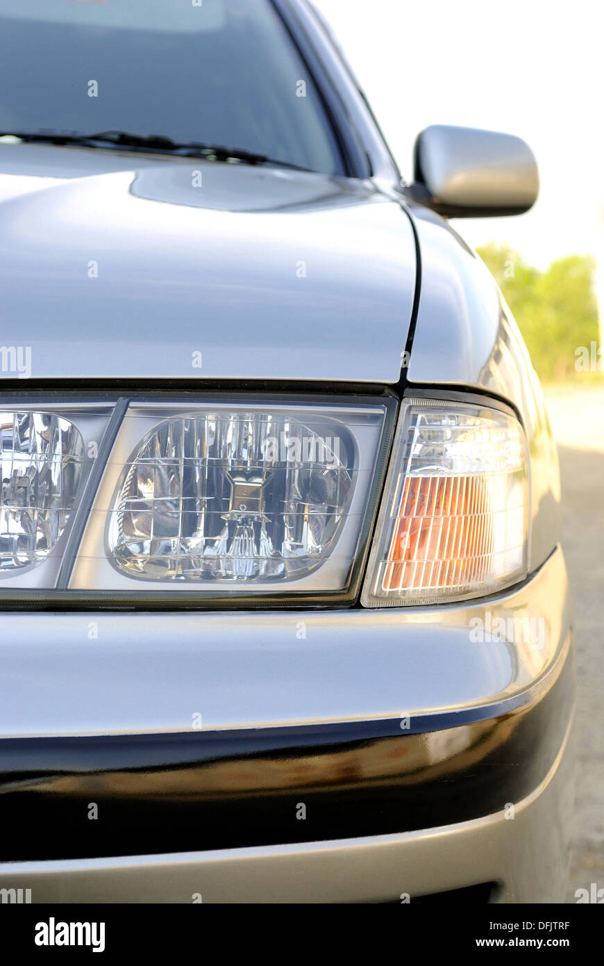The left headlight of the gray modern car Stock Photo - Alamy