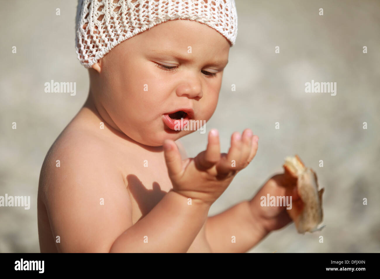 Child eating croissant hi-res stock photography and images - Alamy