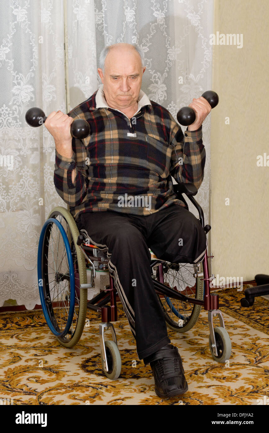 Disabled man lifting weights hi-res stock photography and images - Alamy