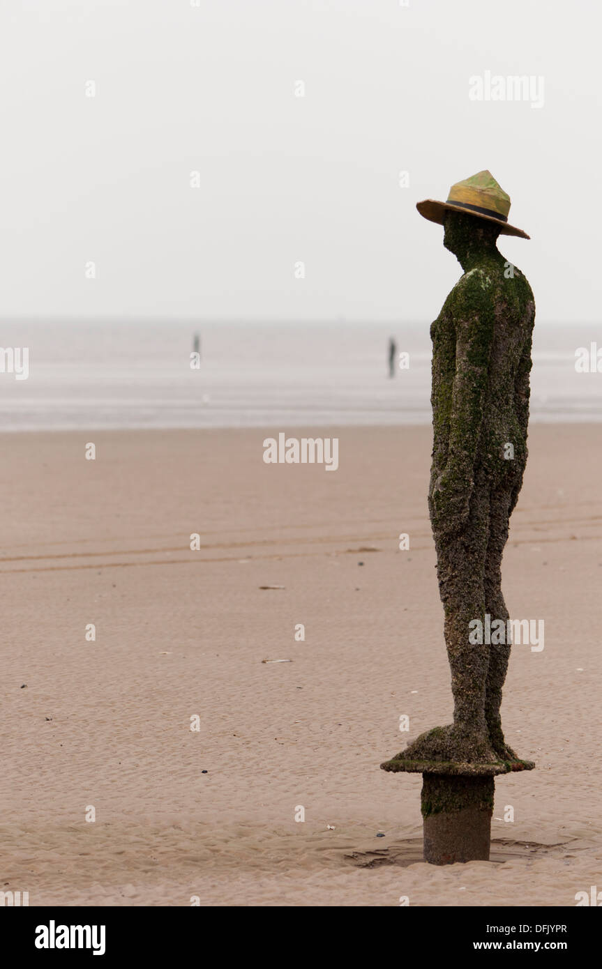 Antony Gormley sculpture Another Place Crosby Beach Stock Photo - Alamy
