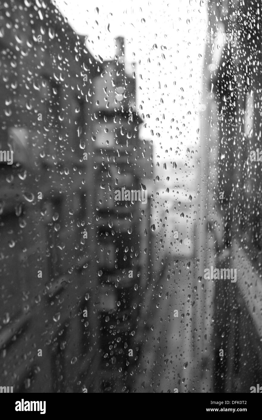 View of the street through windows with rain drops Stock Photo - Alamy