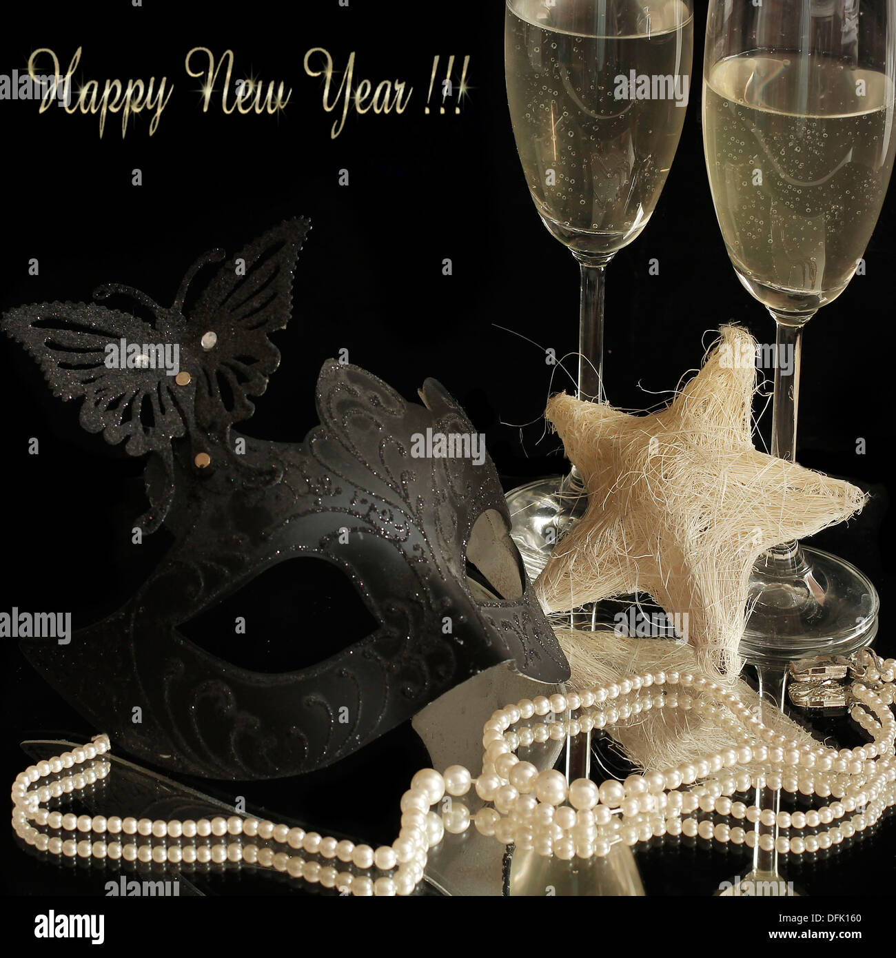 Carnival mask and champagne on black background Stock Photo - Alamy