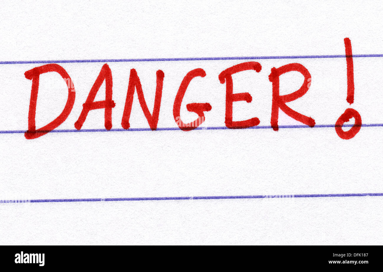 Danger, written in red colour ink on white paper Stock Photo - Alamy