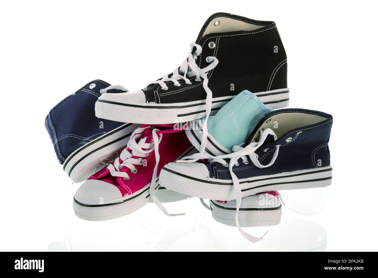 many basketball shoes isolated over white background Stock Photo - Alamy