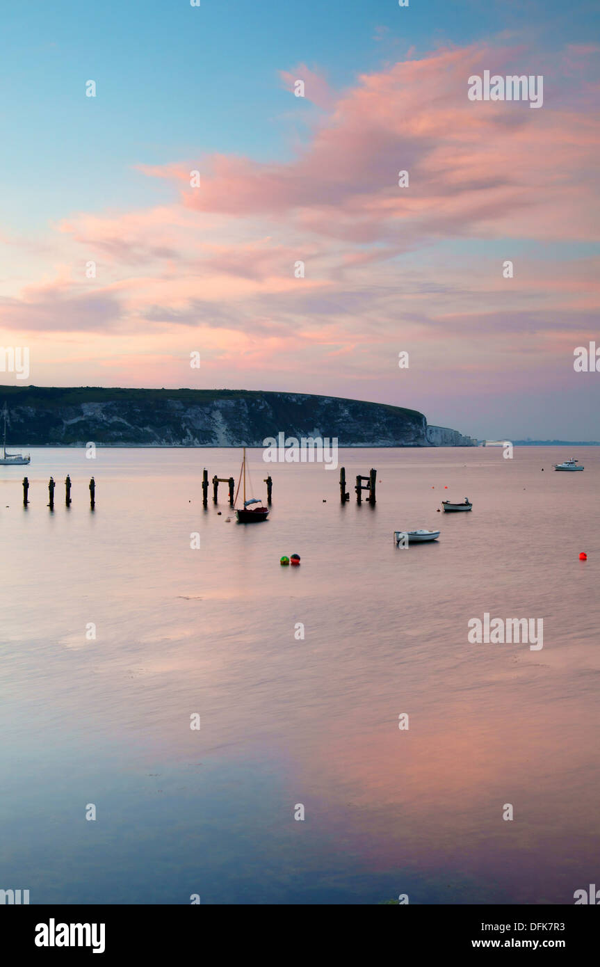 UK,Dorset,Swanage,Sunset over Ballard Point, Old Pier & Swanage Bay ...
