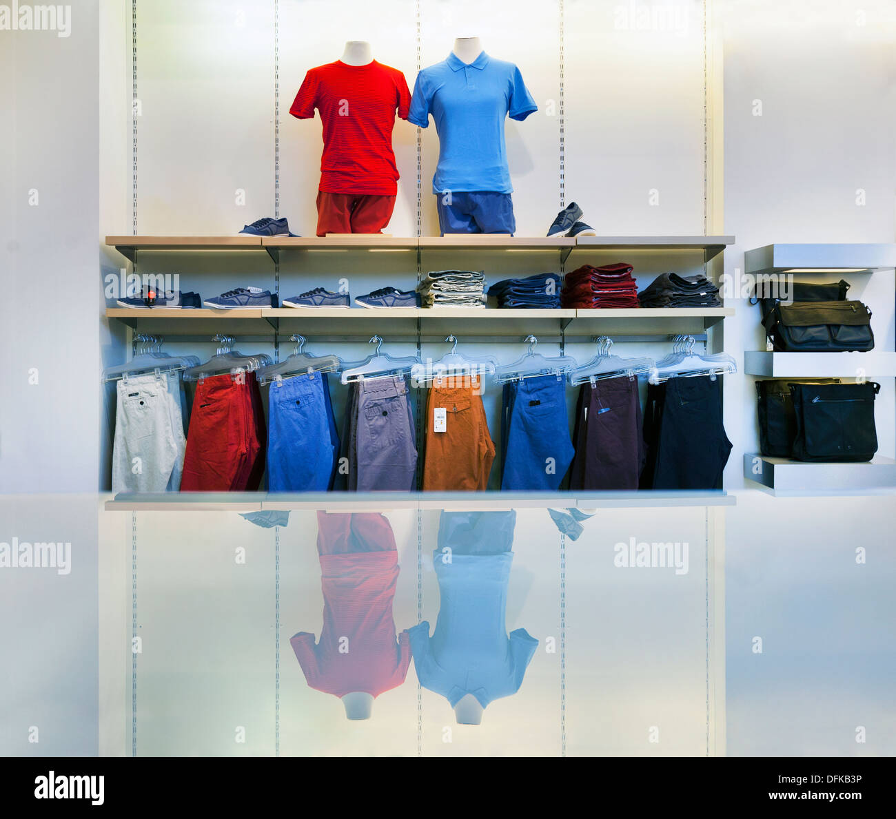 Shop interior with mannequin. Reflection of clothes and dummy. Shelf ...