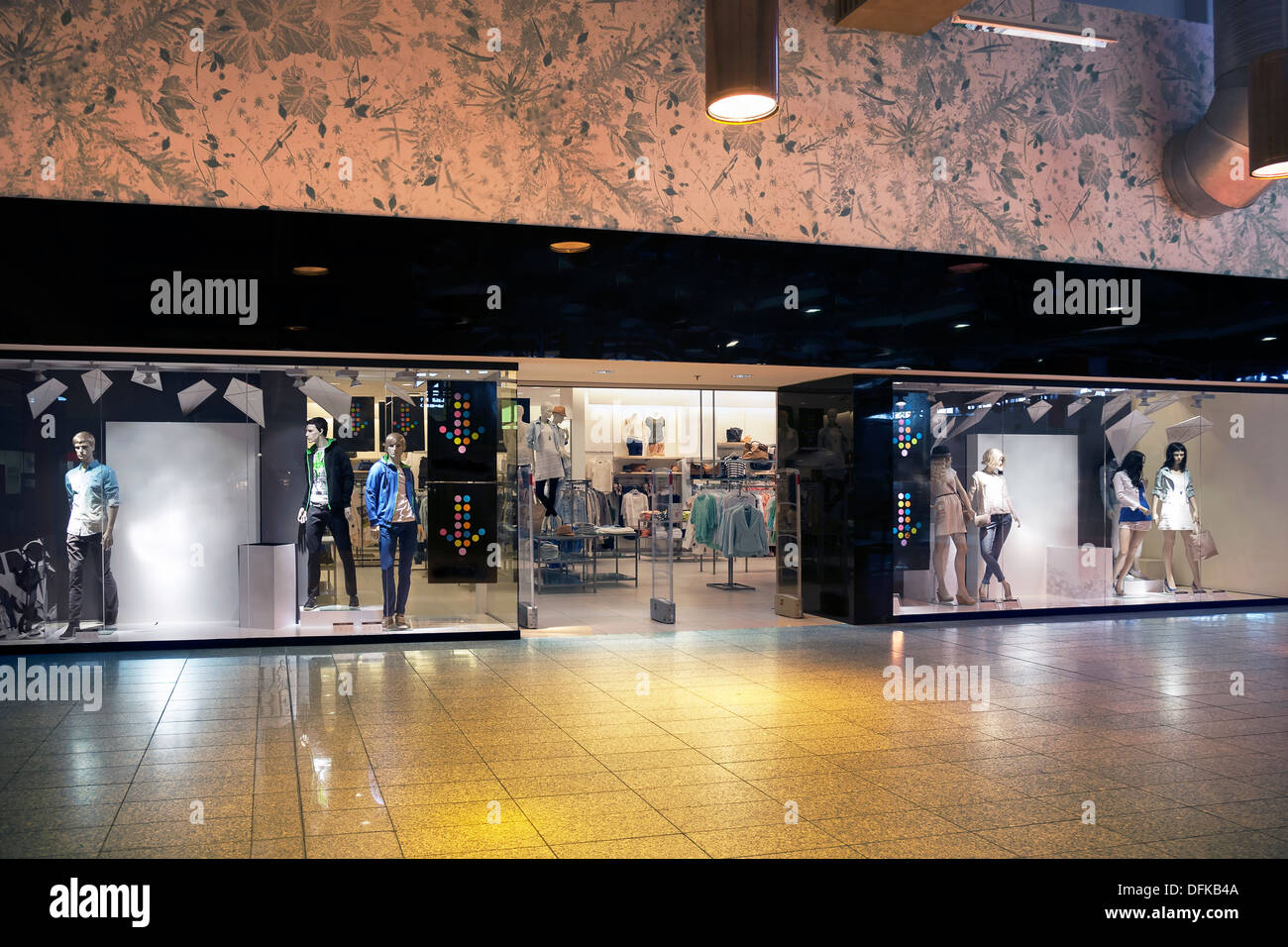 Retail shop entrance or exit. Facade of shop with display. Mannequin ...