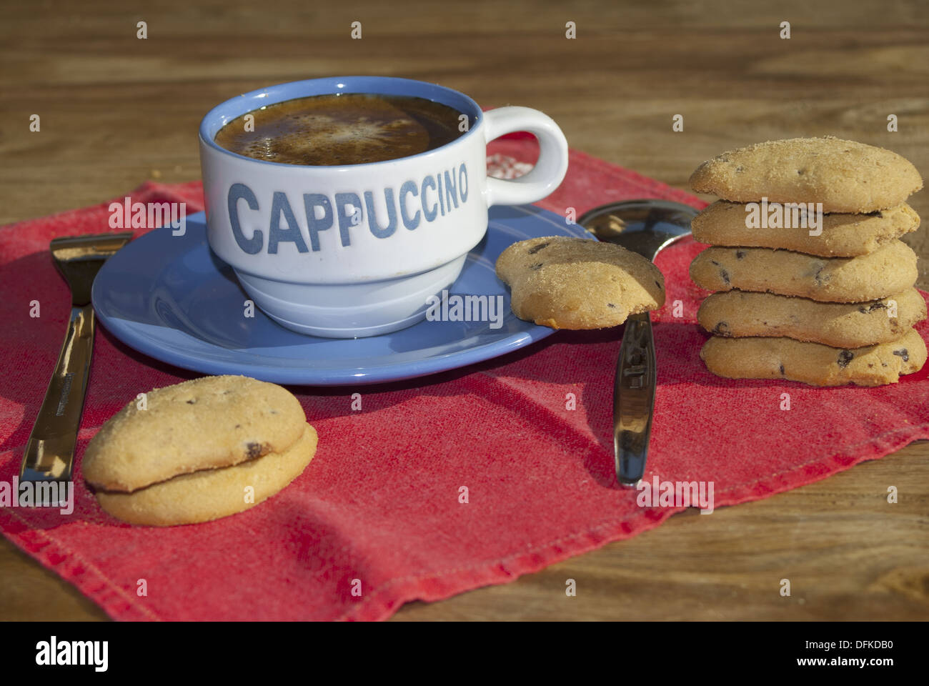 Italian breakfast: cappuccino with chocolate biscuits Stock Photo - Alamy