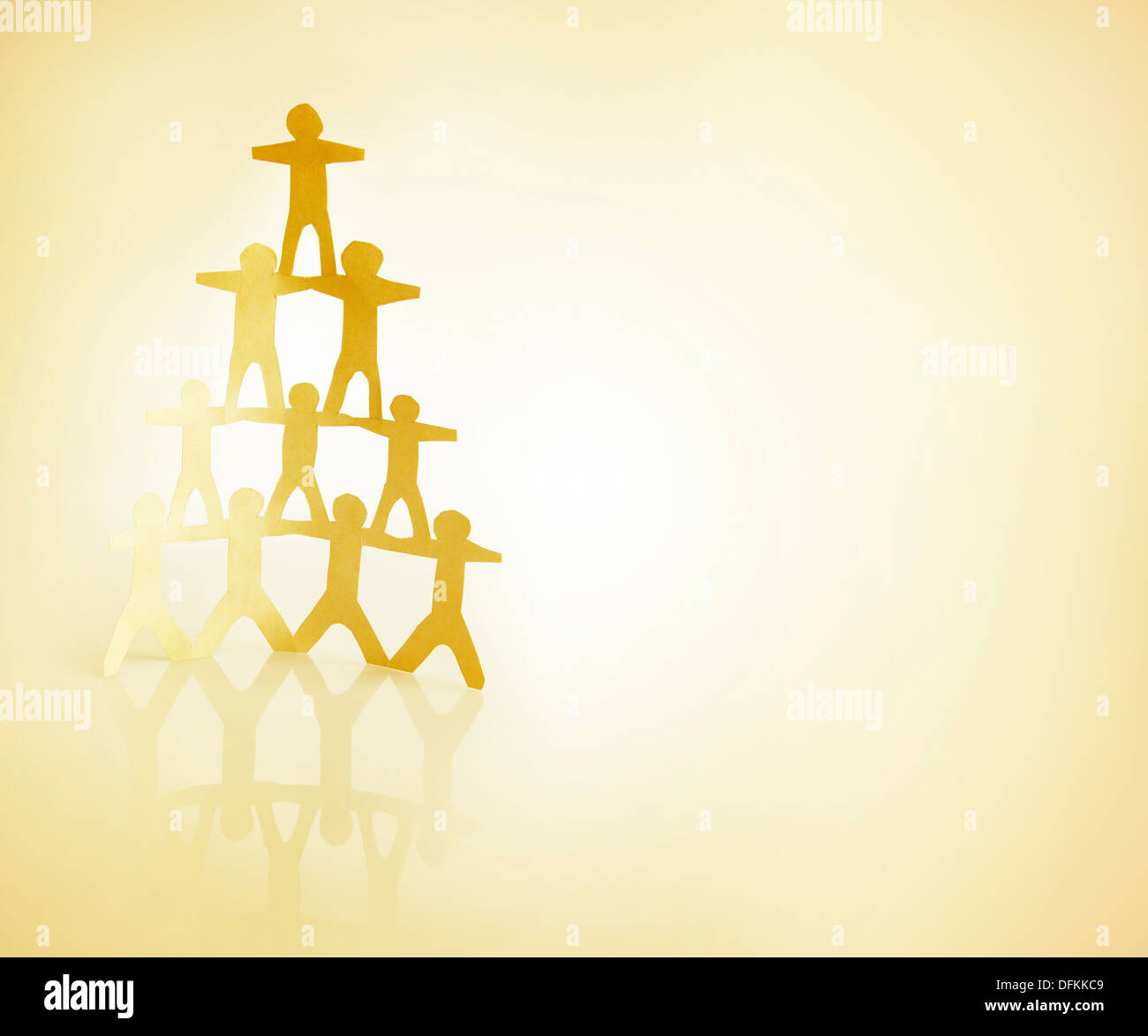 Human team pyramid. Copy space Stock Photo - Alamy