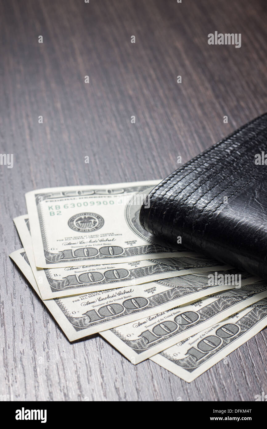 money with leather wallet on table Stock Photo - Alamy