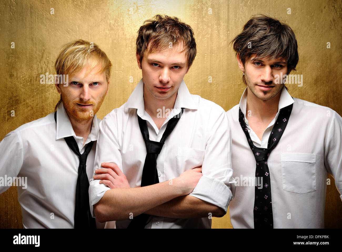 Three handsome young guys Stock Photo - Alamy