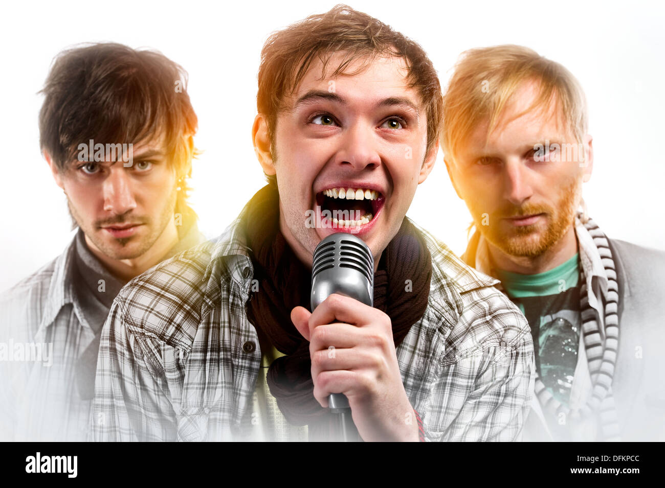 Portrait of three handsome musicians over white background Stock Photo ...