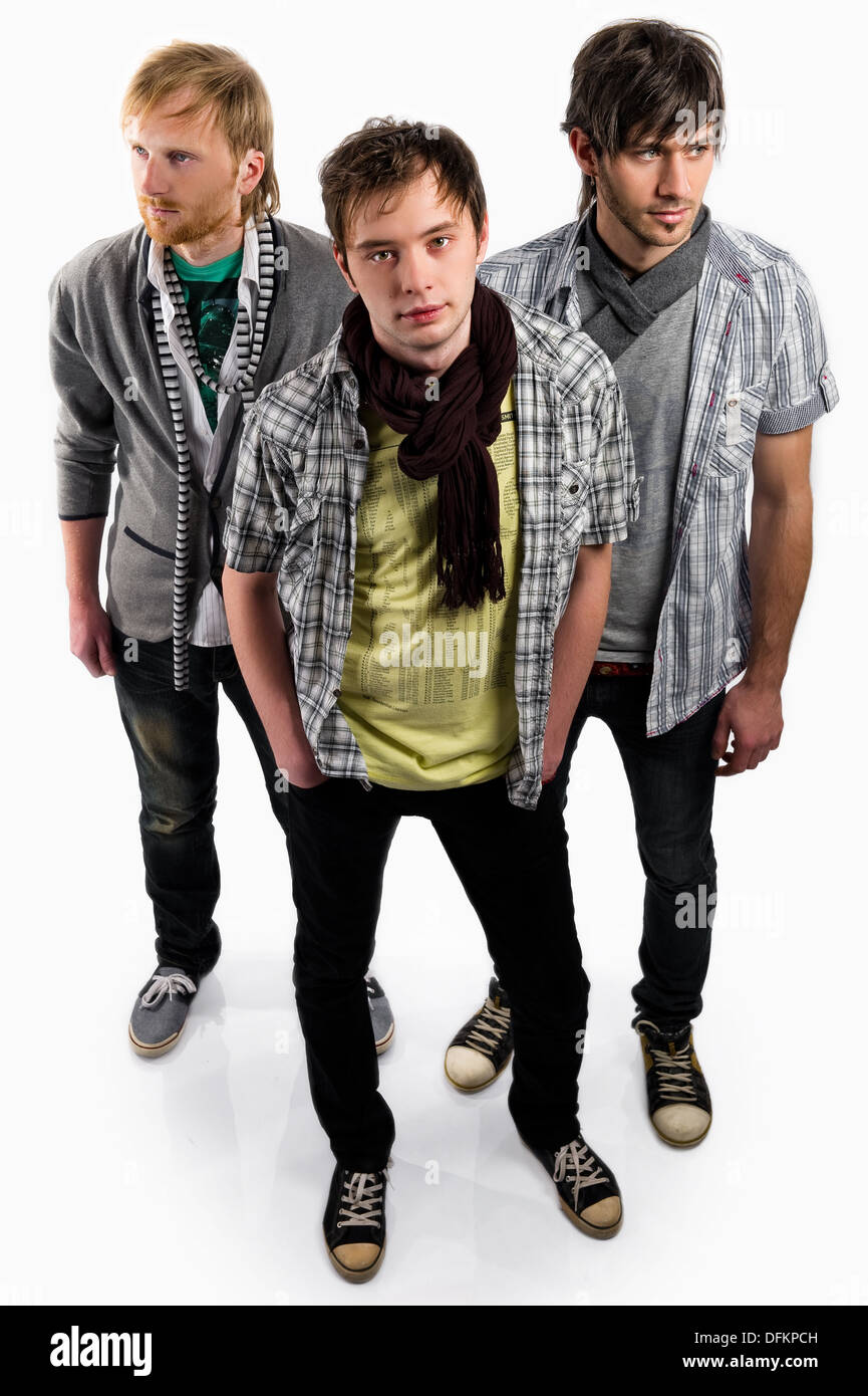 Three handsome guys over white background Stock Photo - Alamy