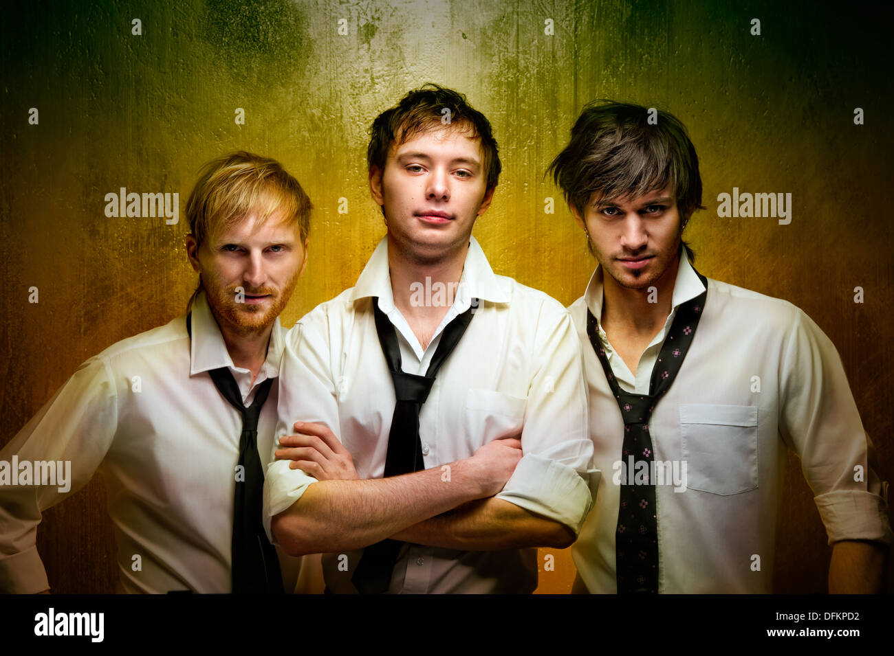 Three handsome young guys Stock Photo - Alamy