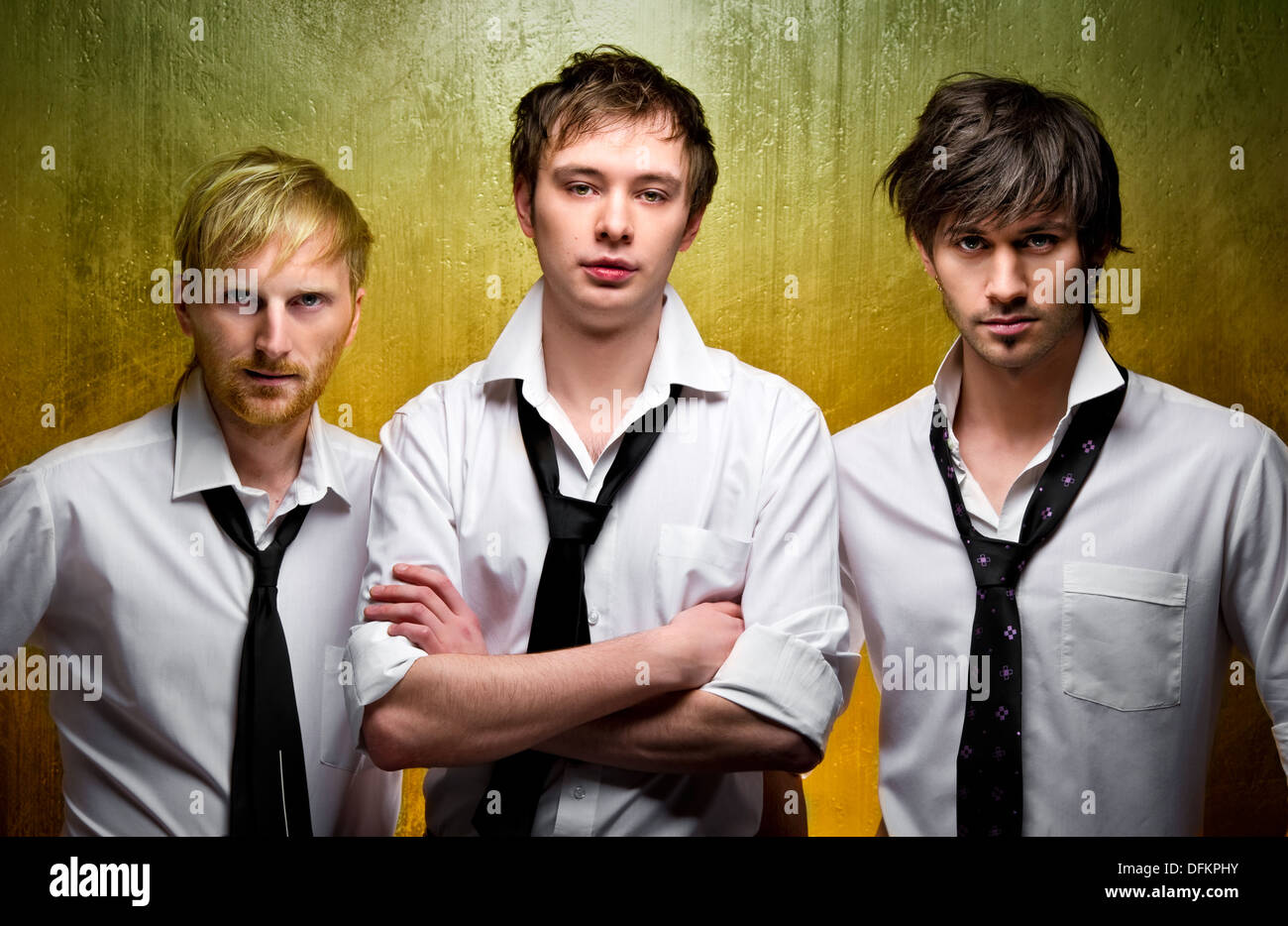 Three handsome young guys Stock Photo - Alamy