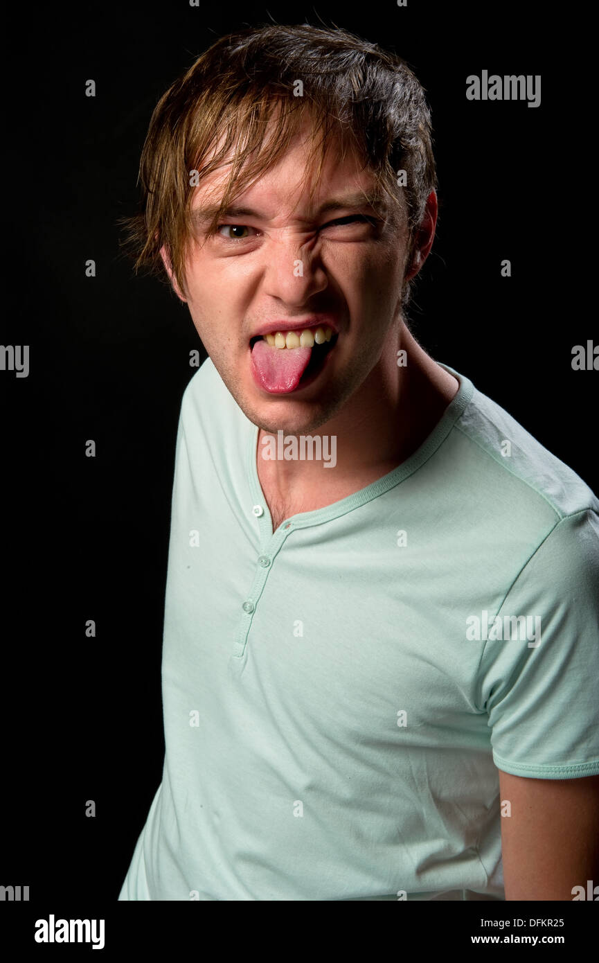 Man making funny face Stock Photo - Alamy