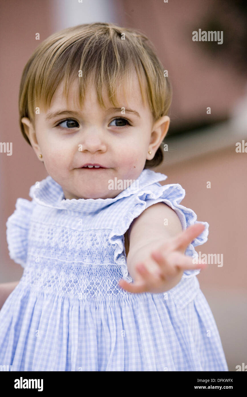 Baby girl taking first steps hi-res stock photography and images - Alamy