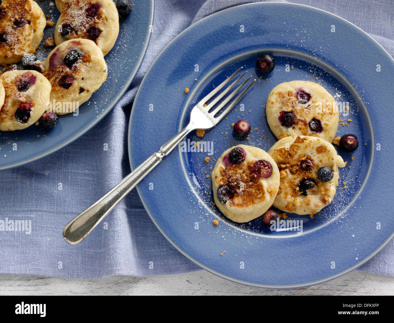 Silver dollar ginger snap Huckleberry pancakes Stock Photo - Alamy