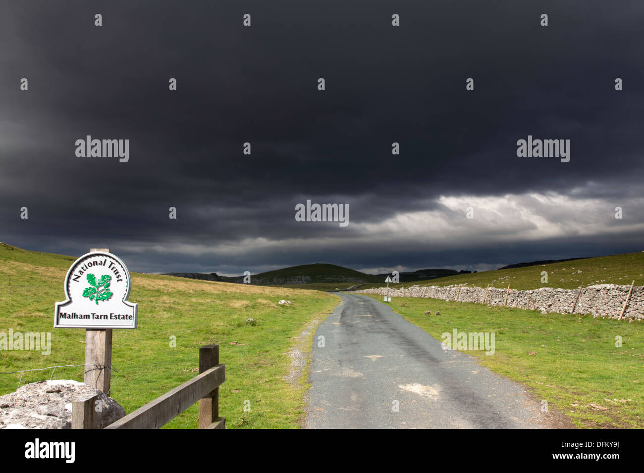 Storm clouds over cattle grid warning sign at Malham Tarn, Yorkshire ...