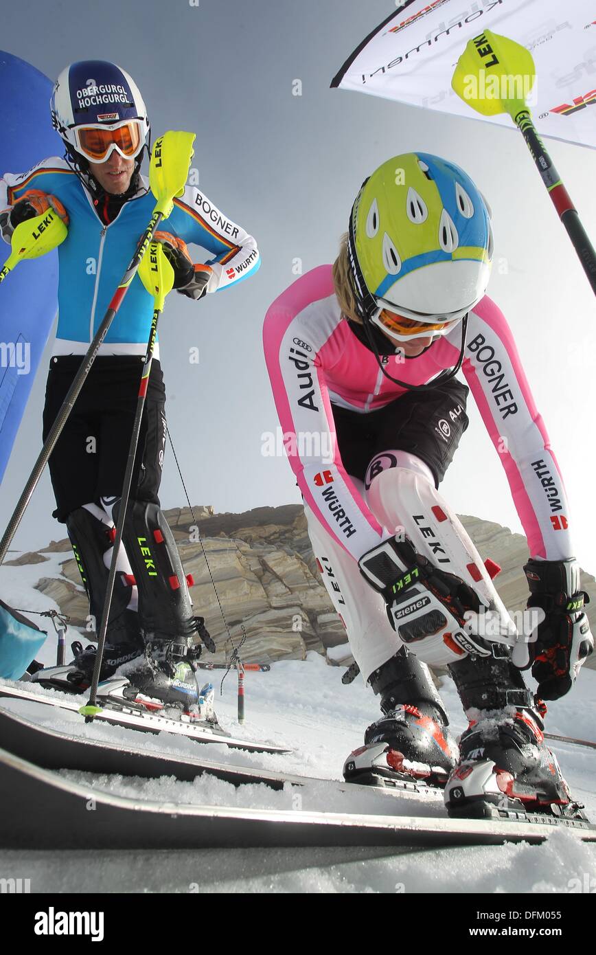 Flattach, Austria. 07th Oct, 2013. German ski racers Fritz Dopfer (L ...