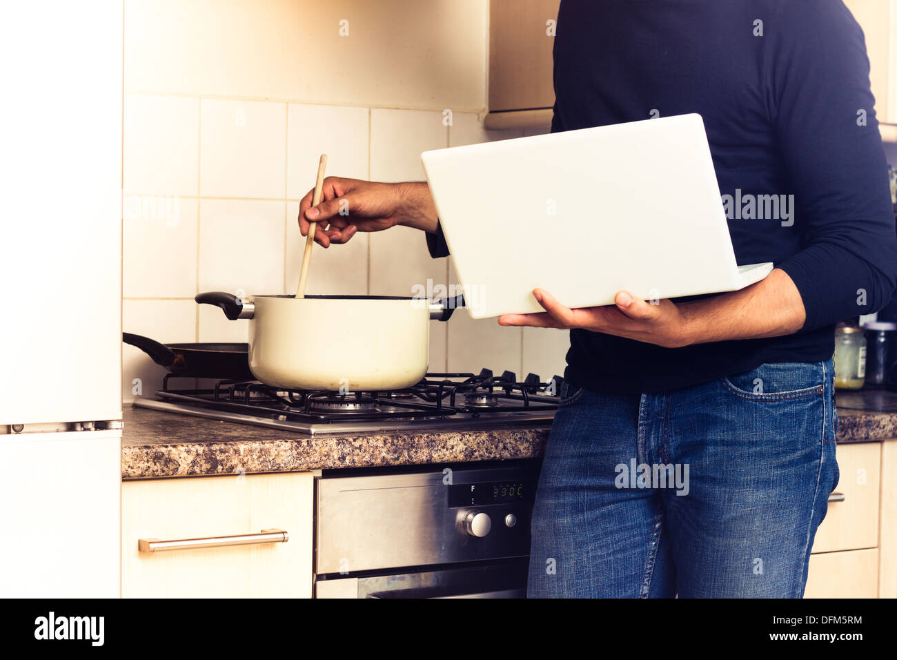 Laptop cooking hi-res stock photography and images - Alamy
