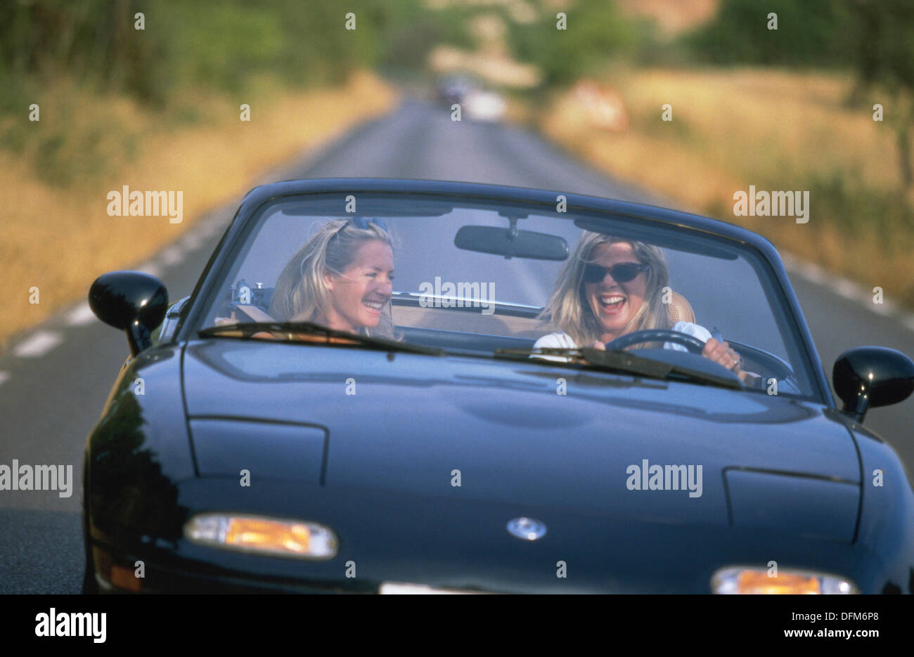 Two women in convertible car hi-res stock photography and images - Alamy