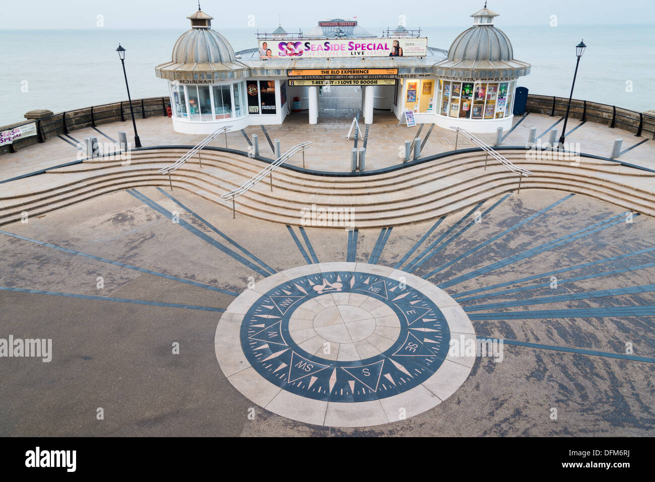 Cromer Pier Norfolk UK at dusk with signs and lights Stock Photo - Alamy