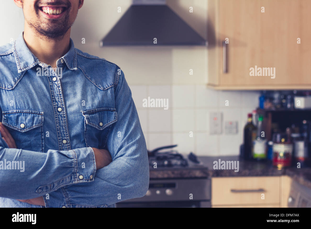 Kitchen man young smile not outside hi-res stock photography and images ...