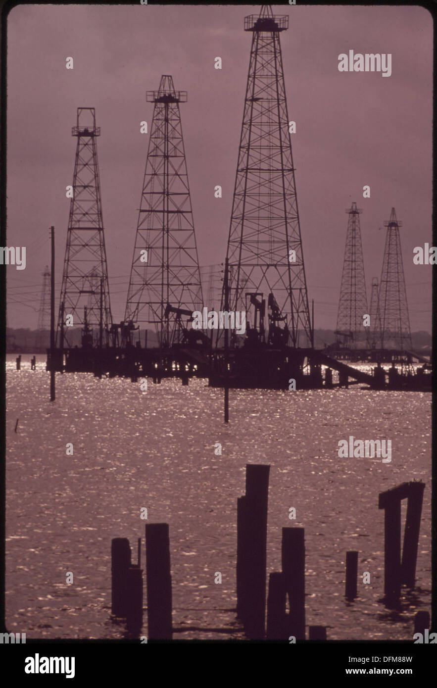 A photograph of an oil field, showing oil extraction operations ...