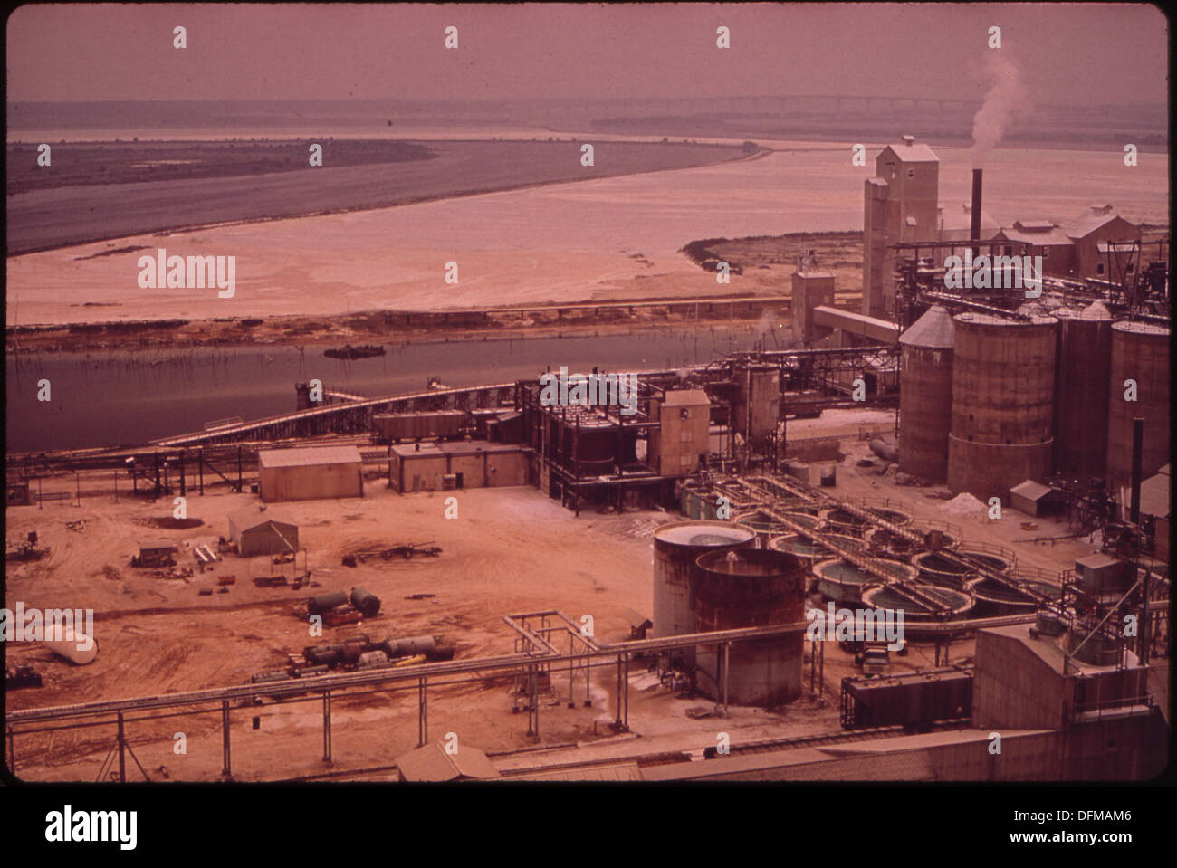 The Olin-Mathieson plant, located beside the Calcasieu River, is an ...