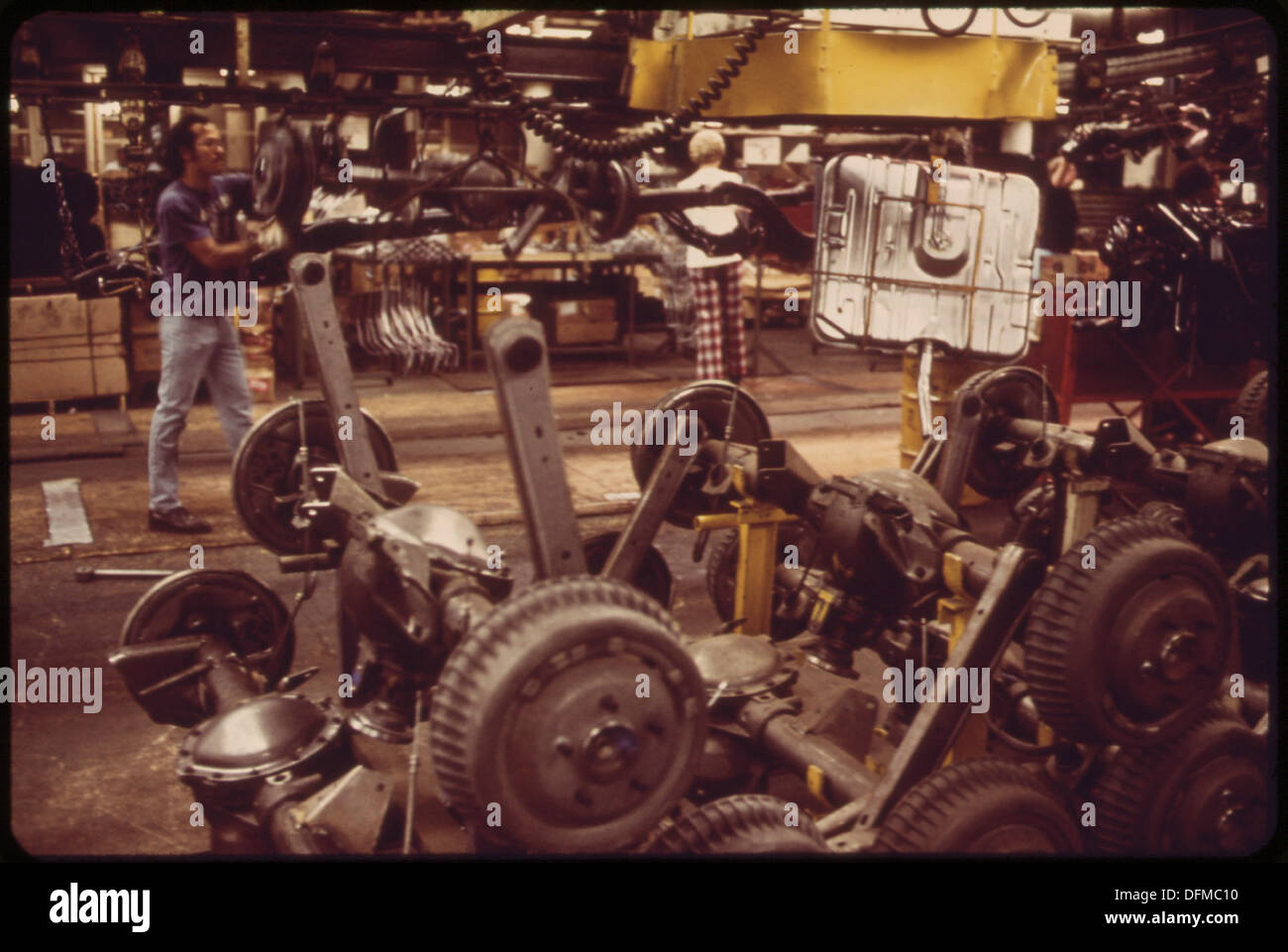 The Cadillac assembly line shows axles prepared and ready to be matched ...