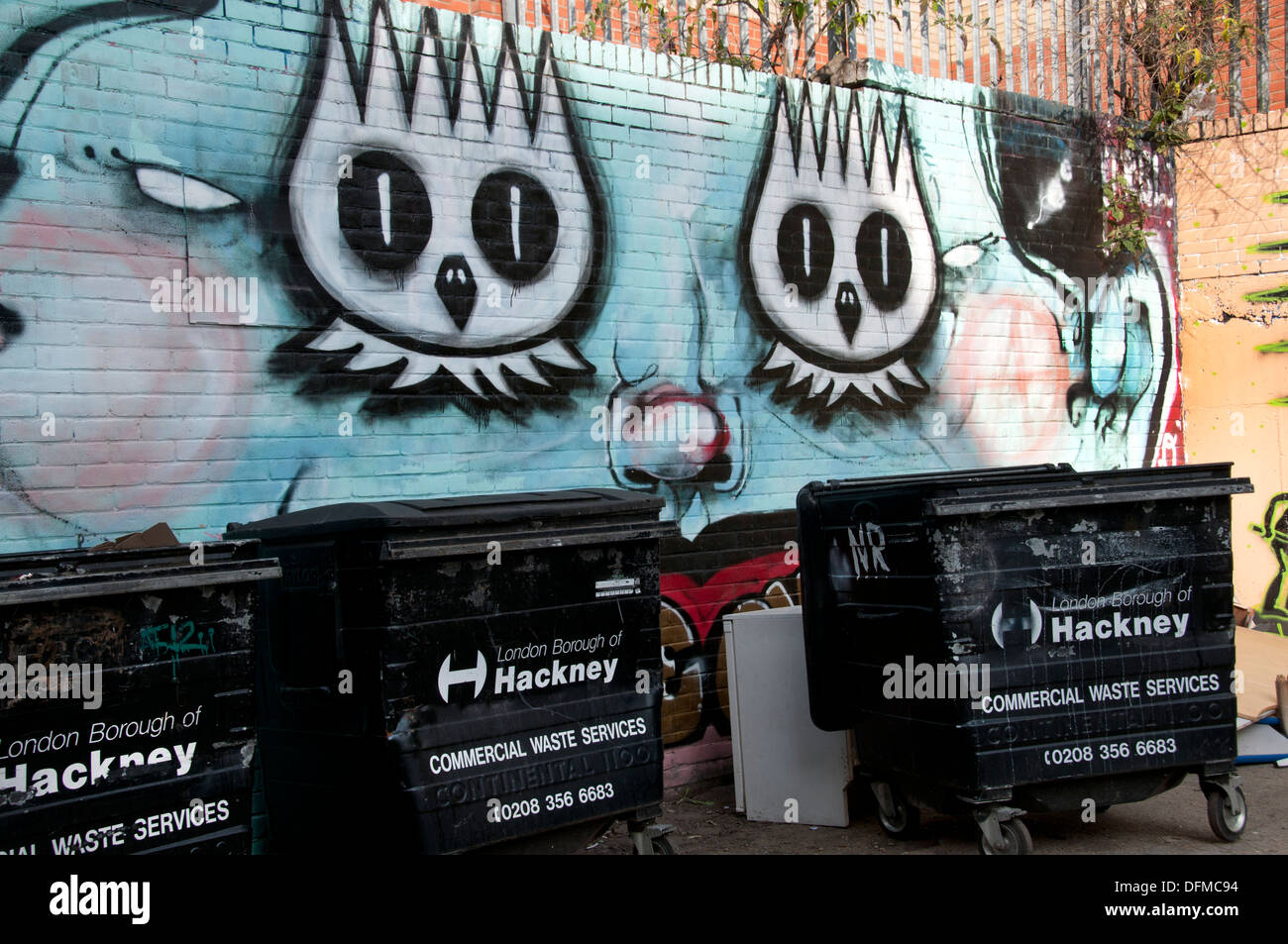 Hackney, London 2013. Graffiti and rubbish bins Stock Photo - Alamy