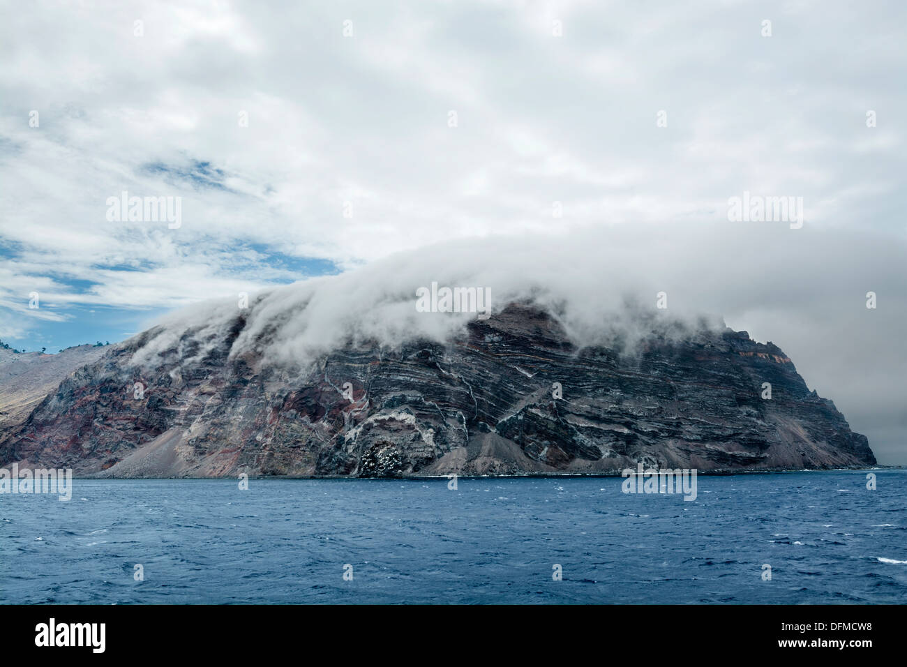 Low clouds hug the remote island of Guadalupe in Mexico Stock Photo - Alamy