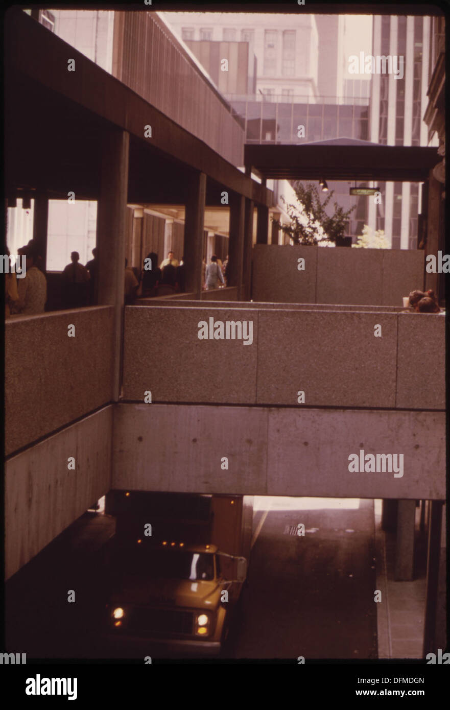 A photograph showing an overhead walkway above Convention Way, with a ...