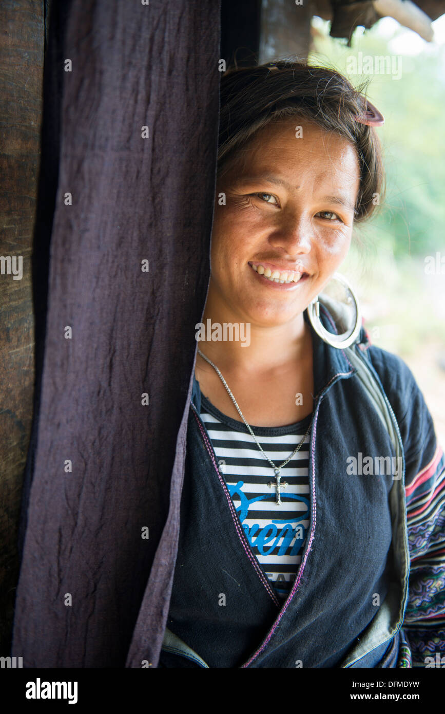 Portrait of minority group Black Hmong`s woman with her handmade hemp ...