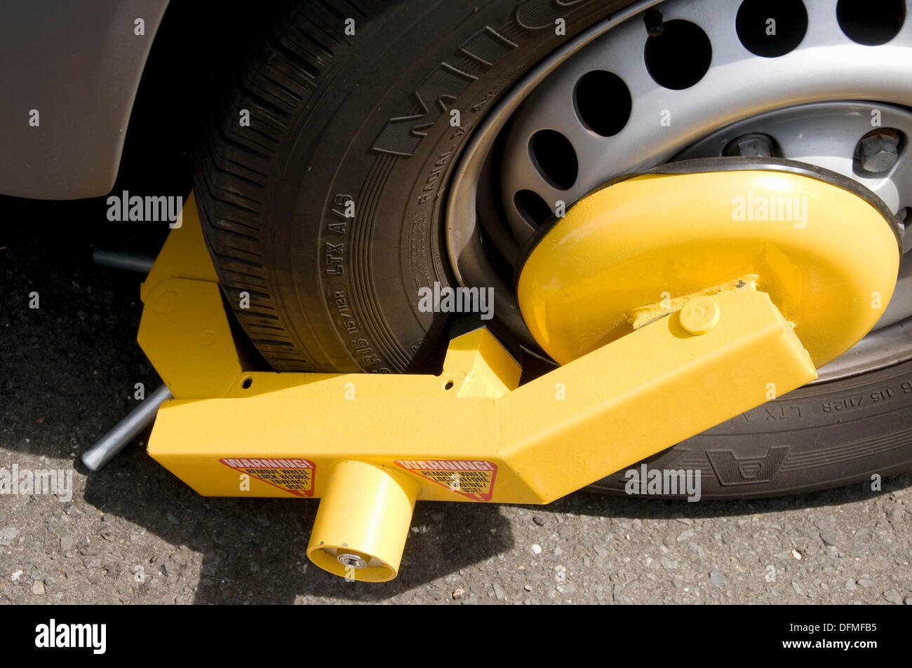 Wheel and clamp hi-res stock photography and images - Alamy