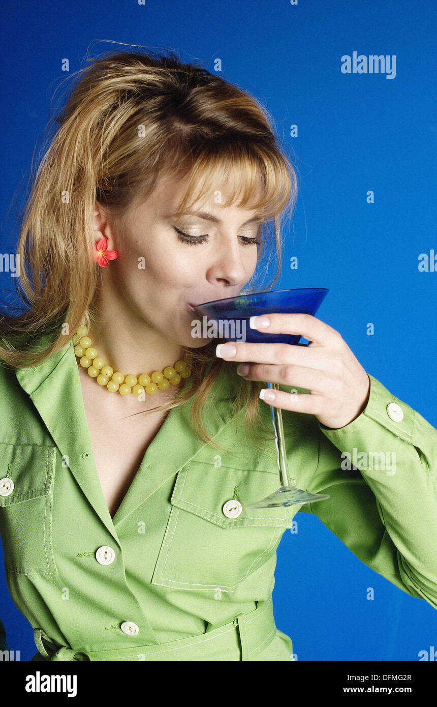 Retro woman drinking martini hi-res stock photography and images - Alamy