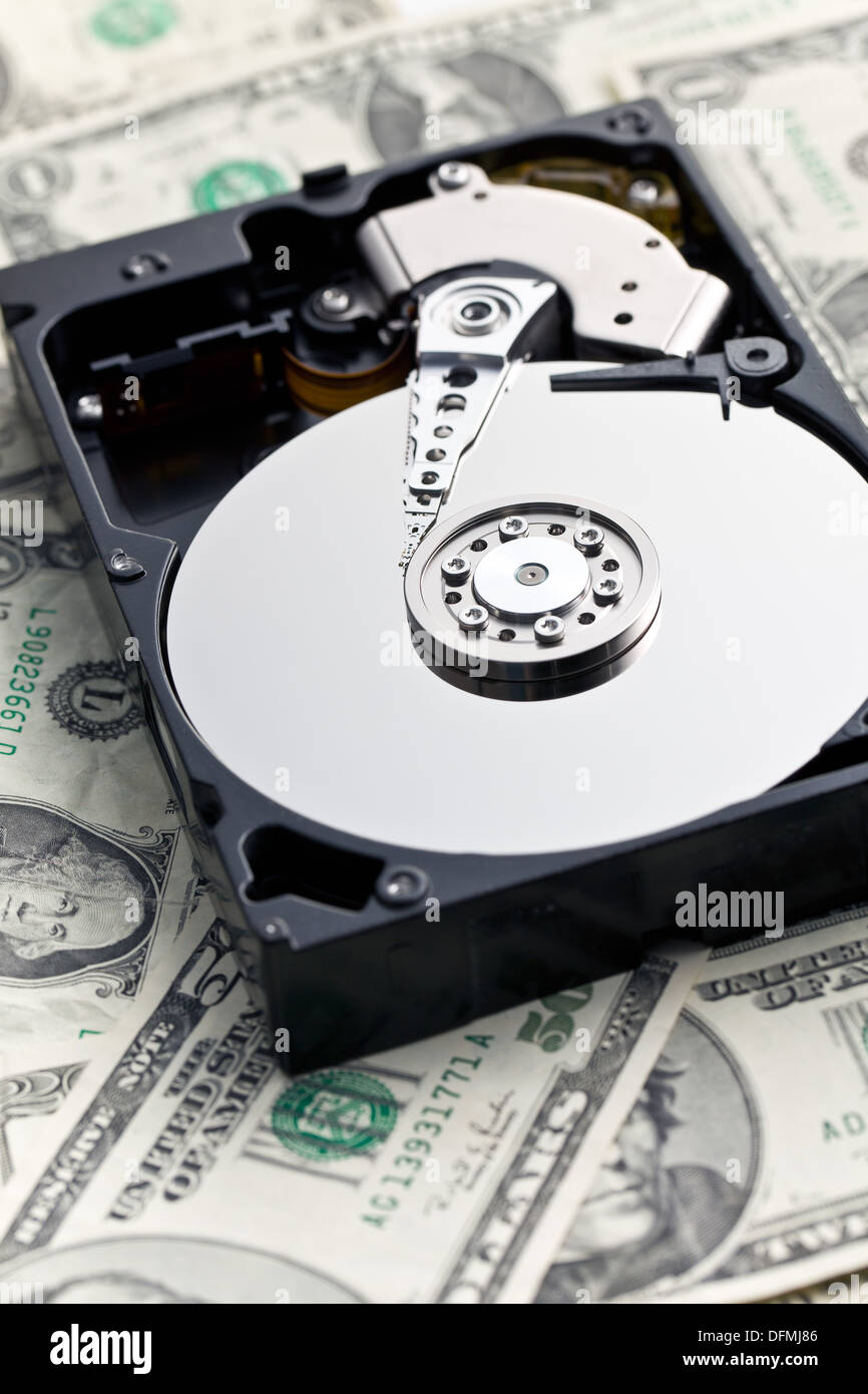 hard disk drive on american dollars Stock Photo - Alamy