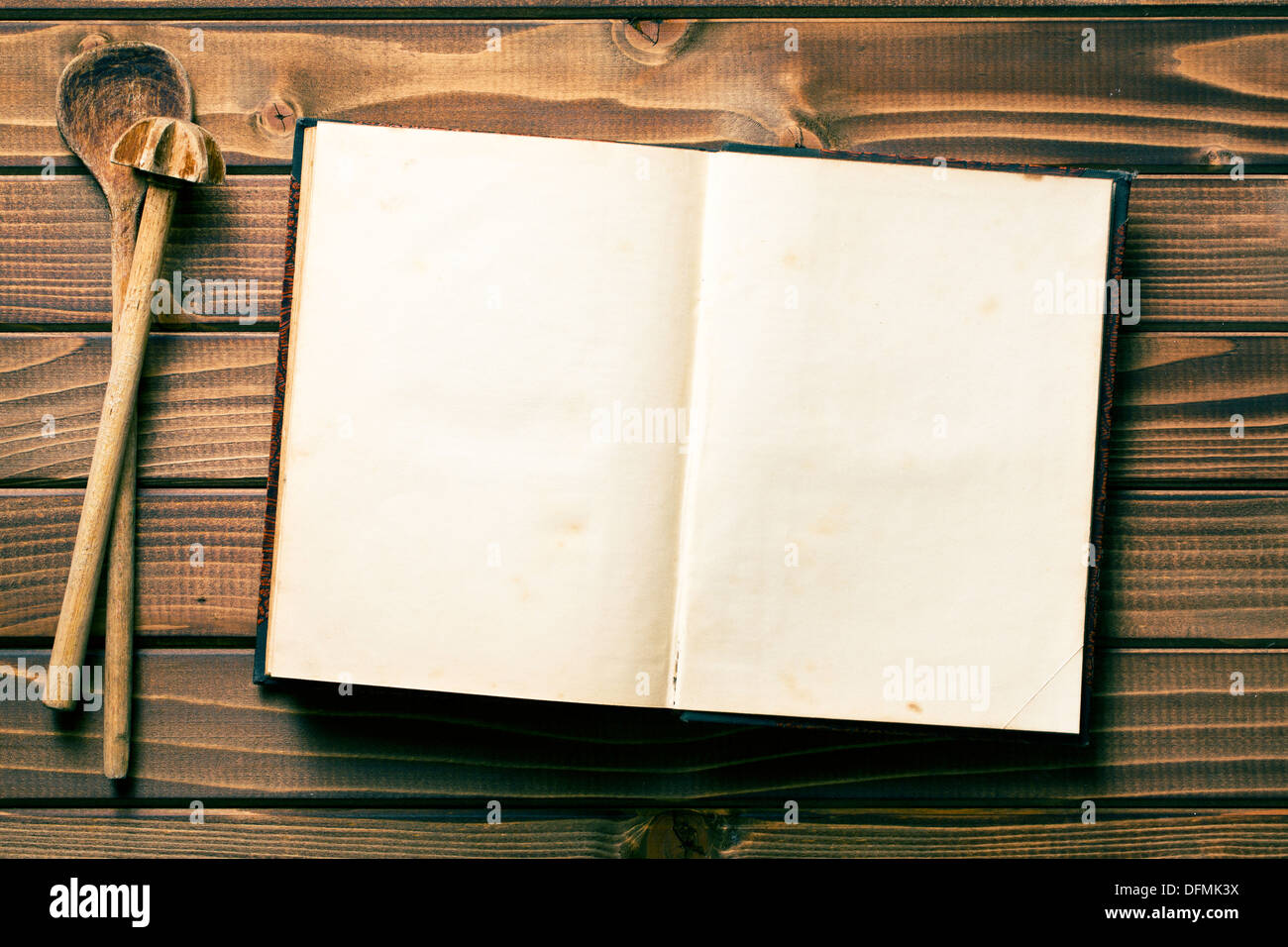 top view of recipe book with stirring spoons Stock Photo - Alamy