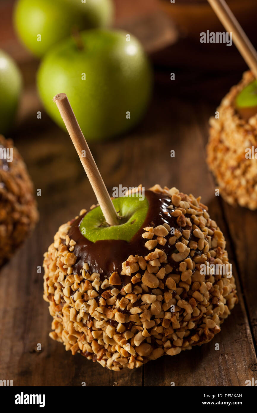 Homemade Caramel Taffy Apple with Peanuts for Halloween Stock Photo - Alamy