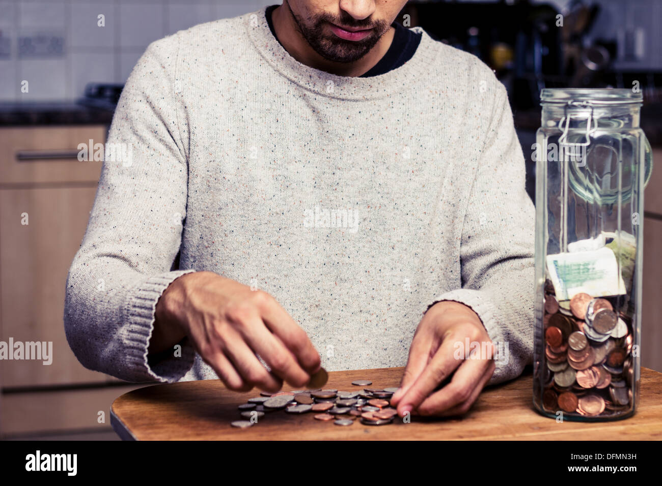 Man counting money hi-res stock photography and images - Alamy