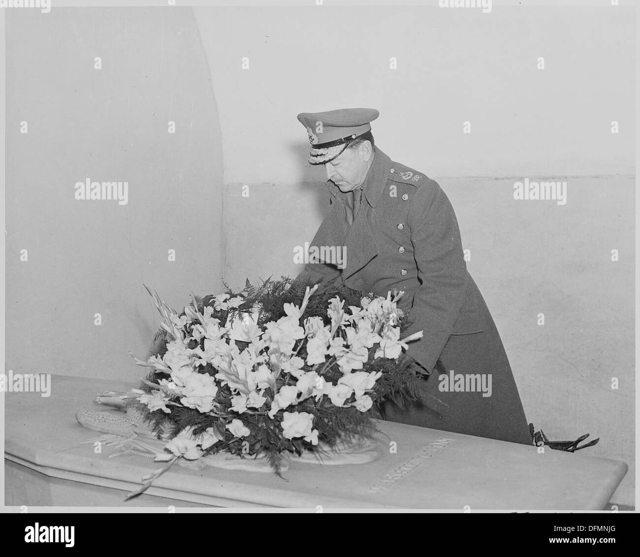 Field Marshal Harold Alexander is pictured laying a wreath at the grave ...