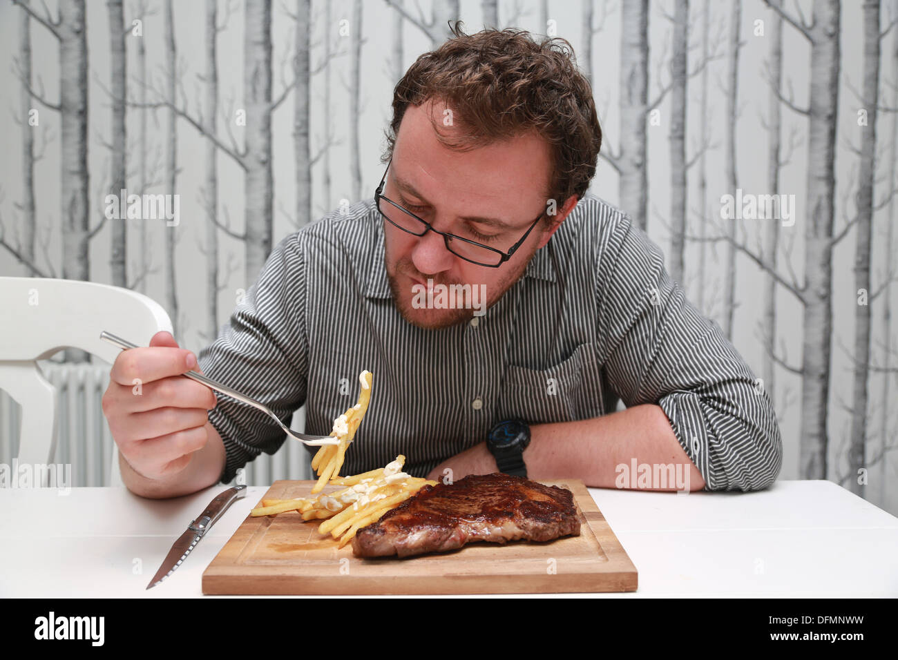 Man eating large juicy steak hi-res stock photography and images - Alamy